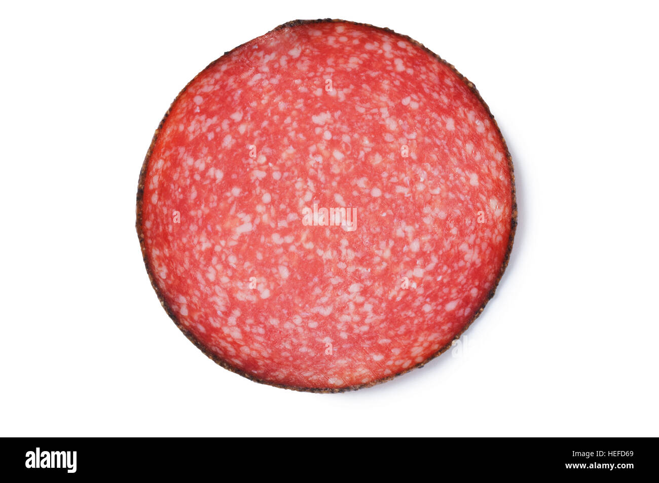 Sliced salami pepper on Cut Out Stock Images & Pictures - Alamy