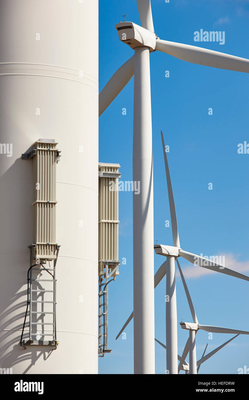 Wind turbines in line. Clean alternative renewable energy. Vertical ...