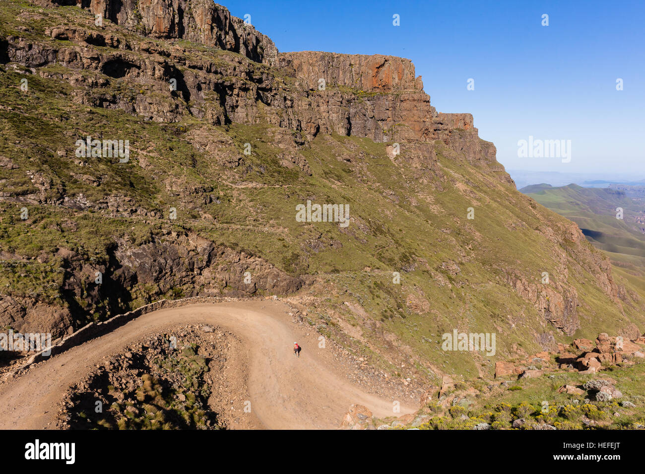 Mountains hiker hiking high overlooking photo of man walking climbing ...