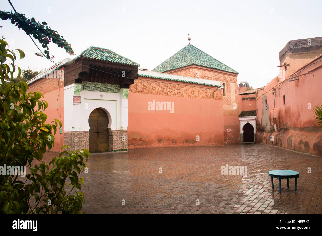 A typical square with red buildings in the center of Marrakesh in ...