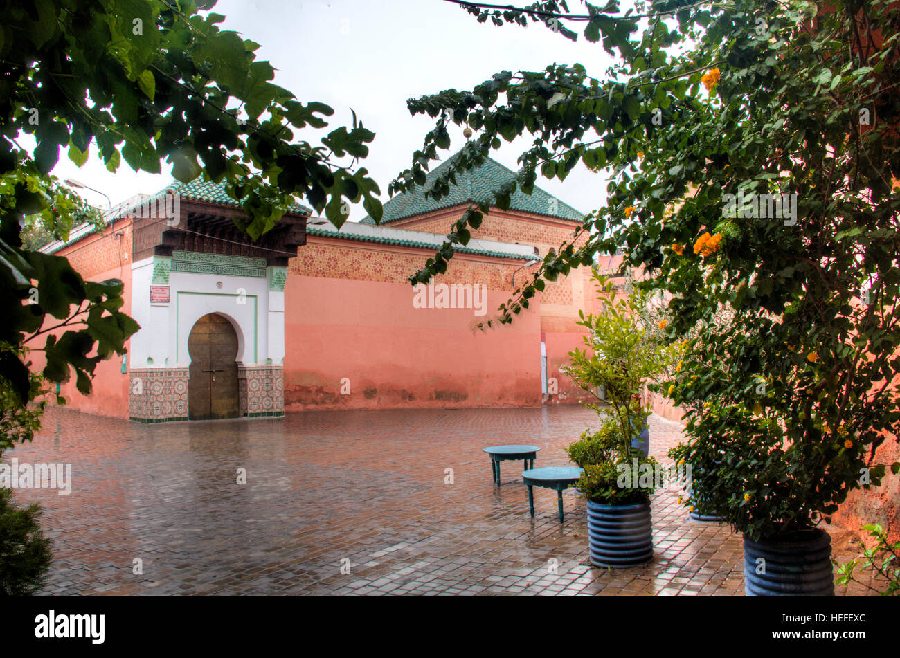 A typical square with red buildings in the center of Marrakesh in ...