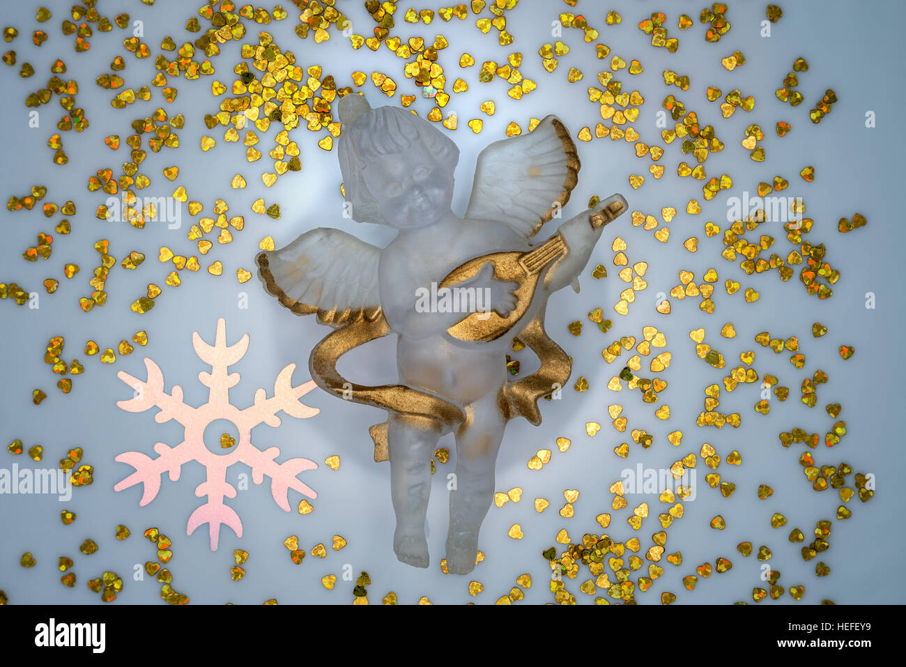 Angel surrounded hi-res stock photography and images - Alamy