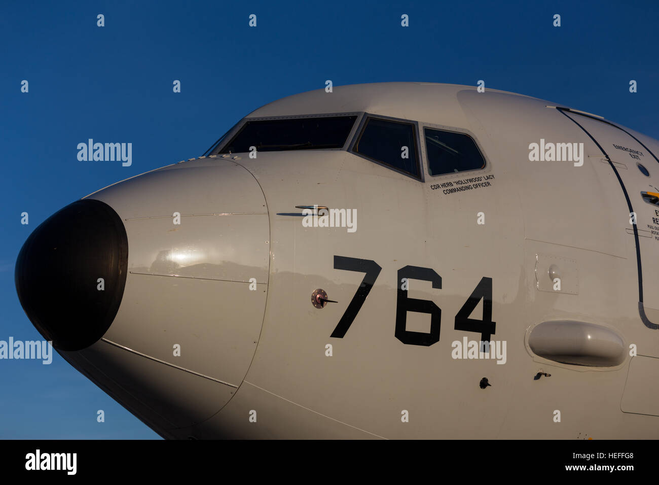 A US Navy Boeing P-8 Poseidon nose section and cockpit windows against ...