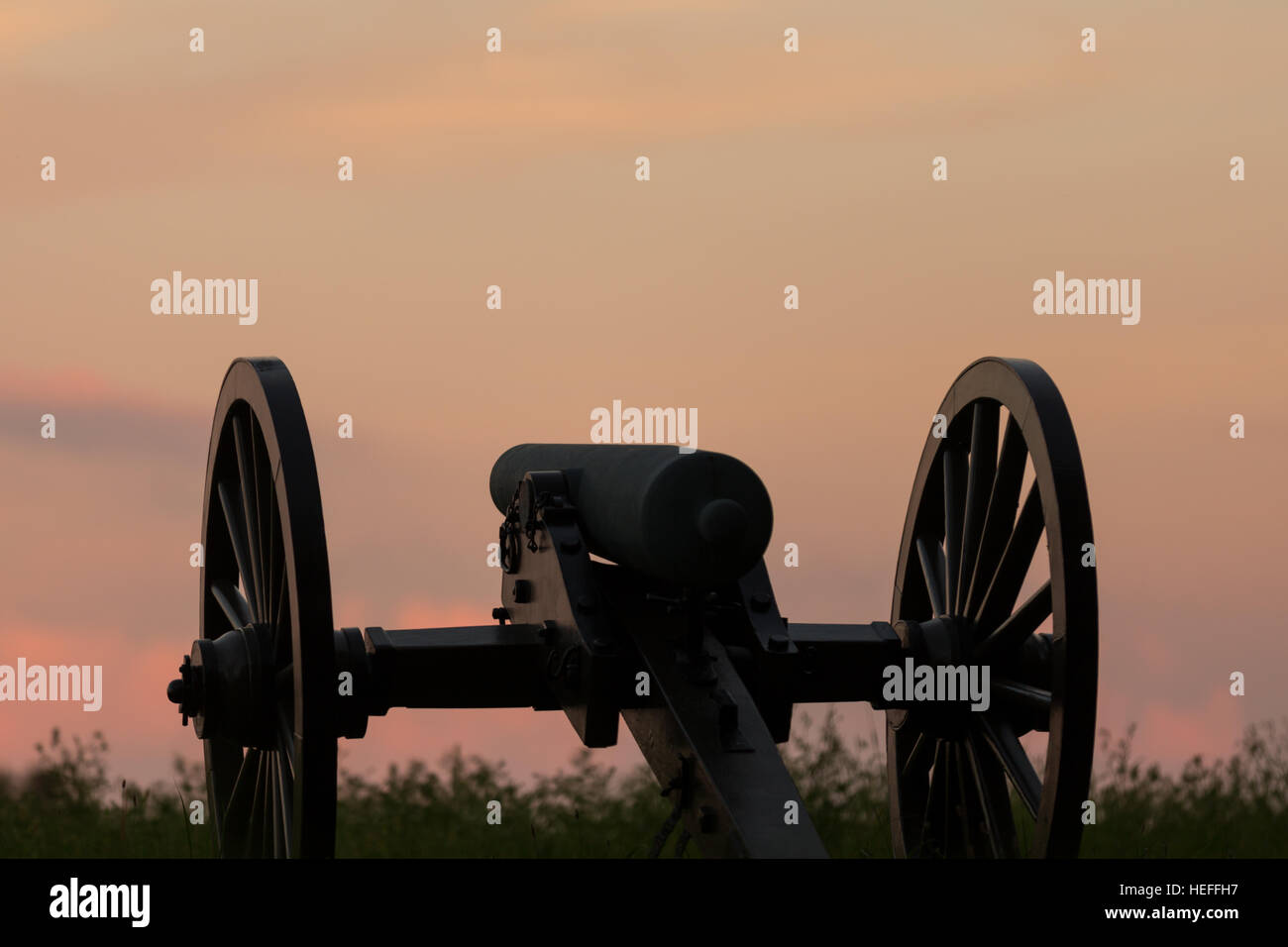 Civil War-era cannon at sunset Stock Photo - Alamy