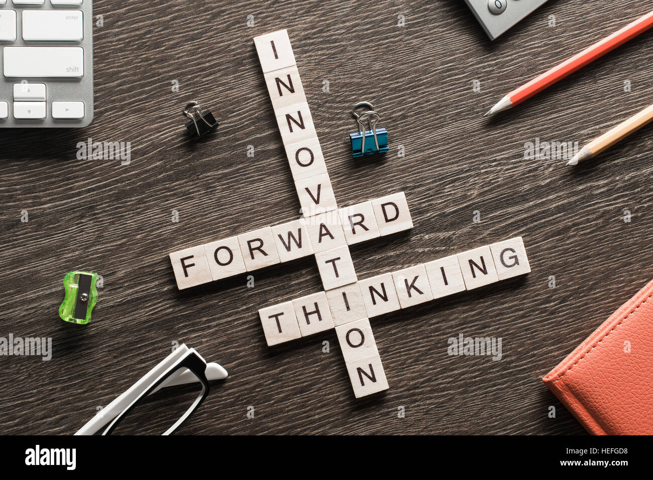 Conceptual media keywords on table with elements of game making ...