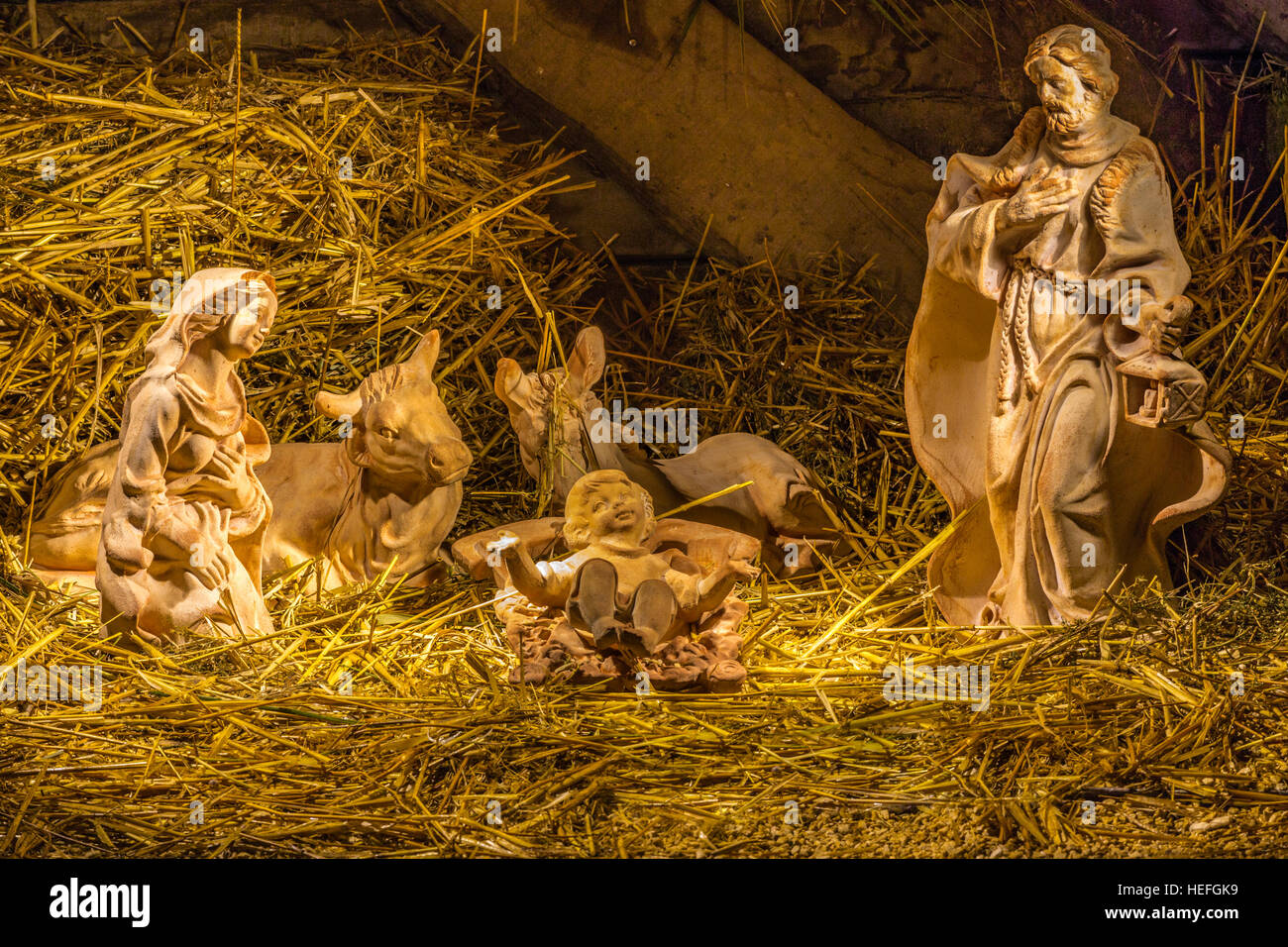 Christmas nativity scene of Holy Baby Jesus in the manger with Blessed ...