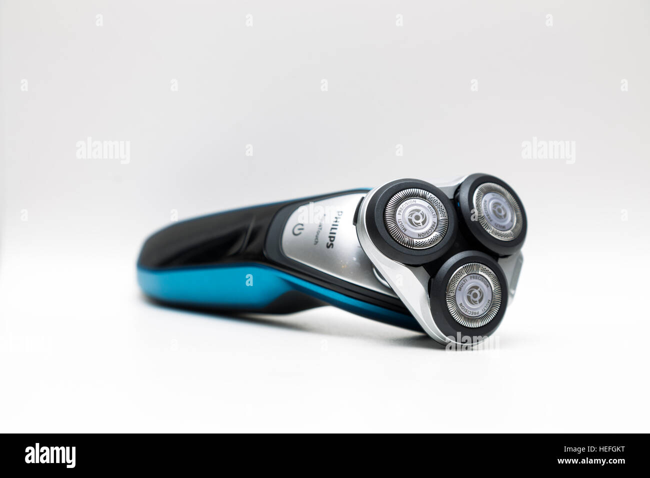 Electric razor on white background Stock Photo - Alamy