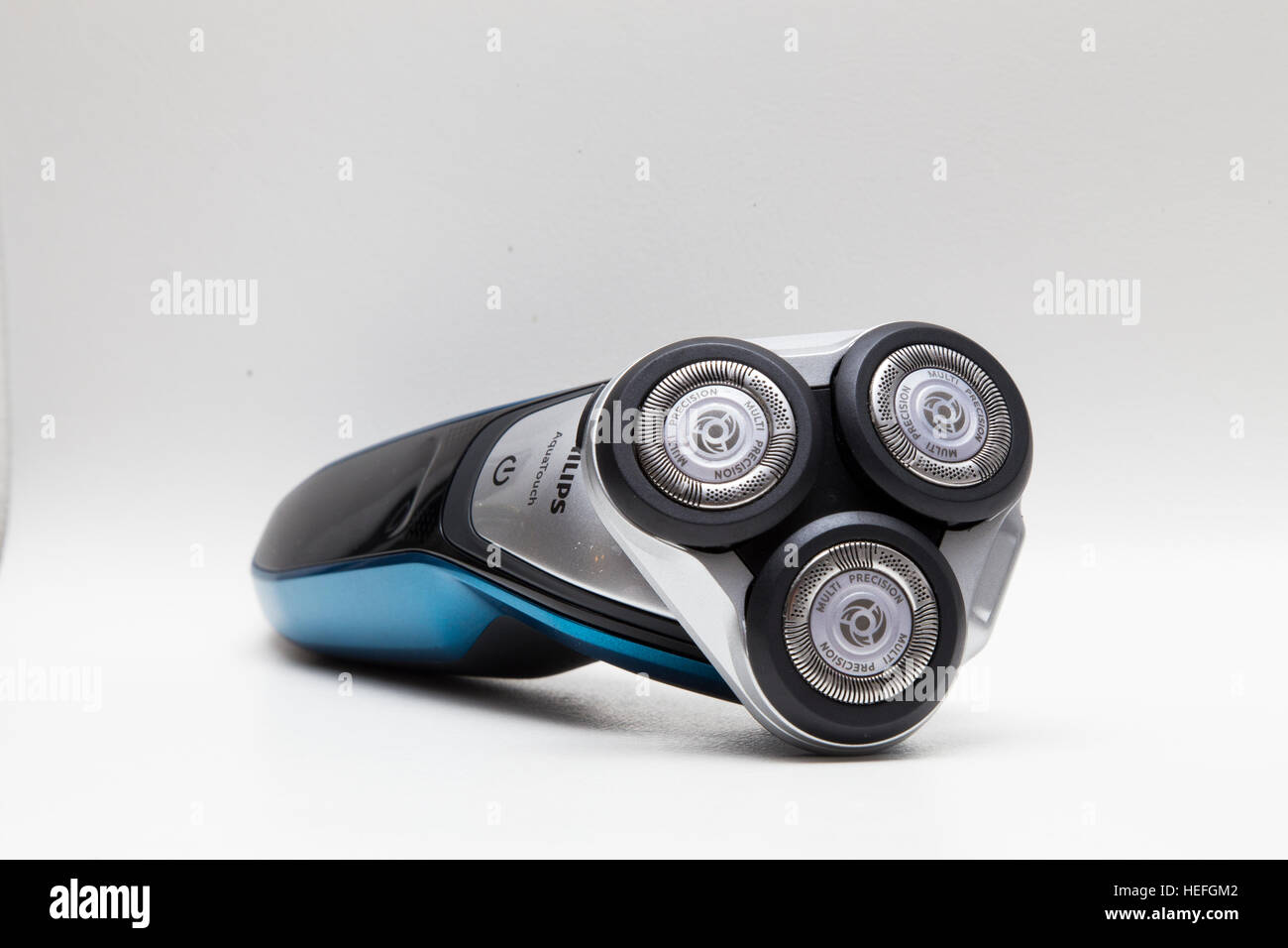 Electric razor on white background Stock Photo - Alamy