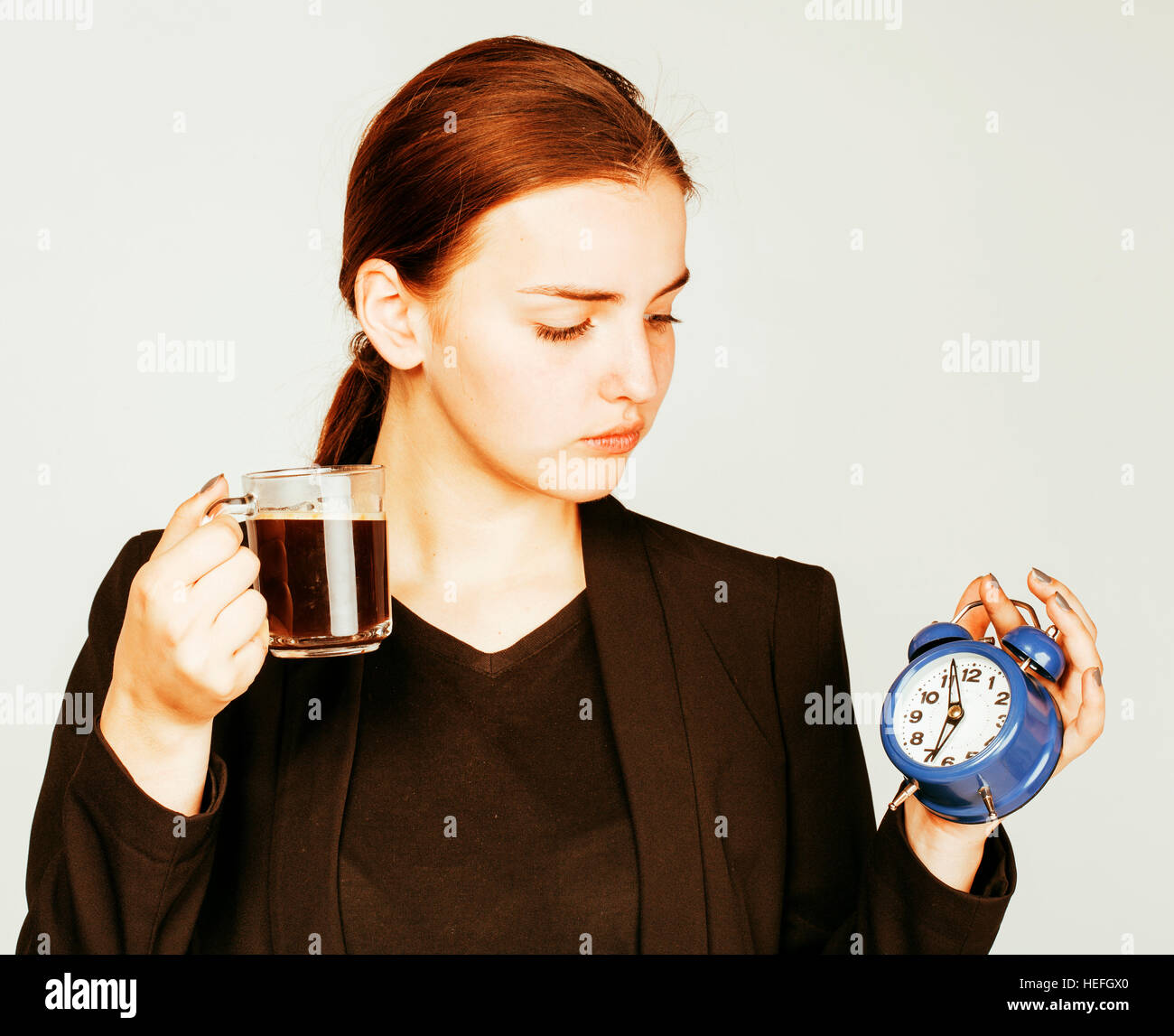 young beauty woman in business style costume waking up for work Stock ...