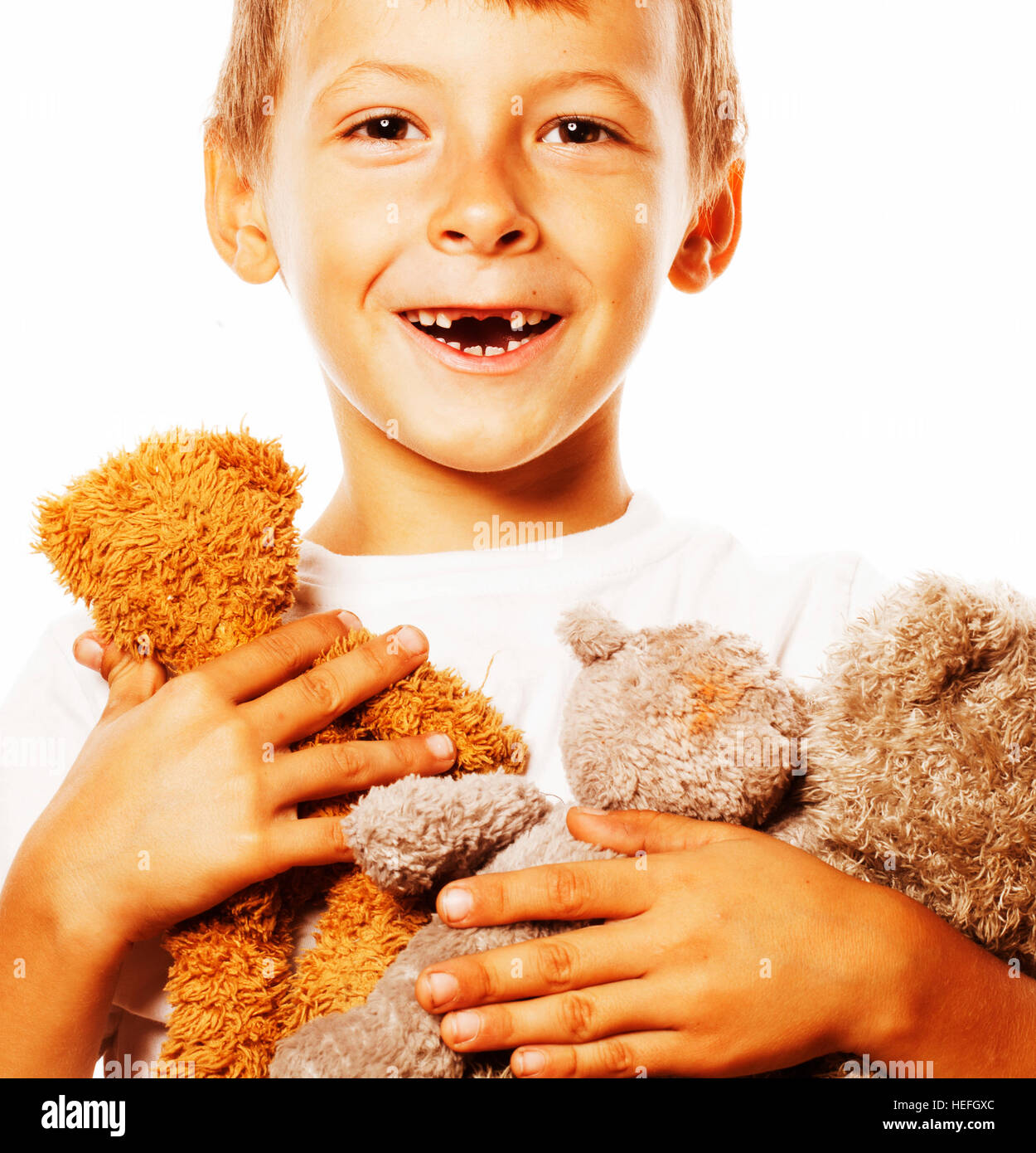 little cute boy with many teddy bears hugging isolated close up Stock ...