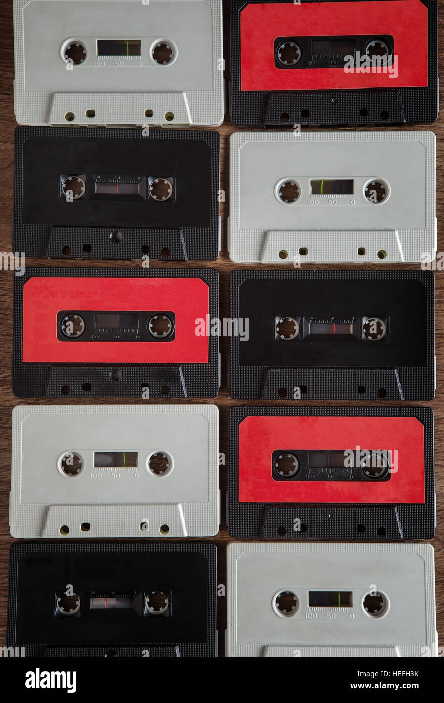 background of cassette tapes on wooden table Stock Photo - Alamy