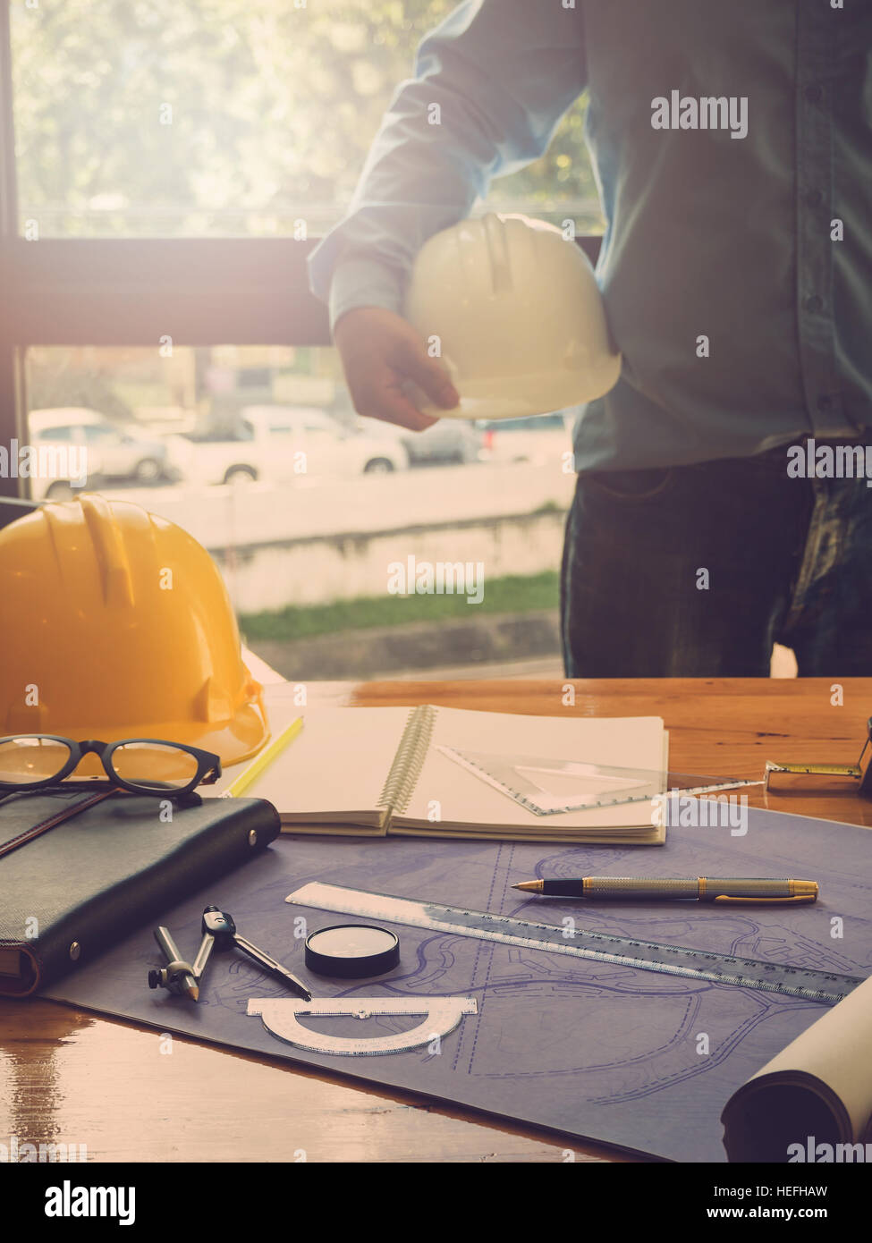 Architect concept, Architects working with blueprints in the office ...