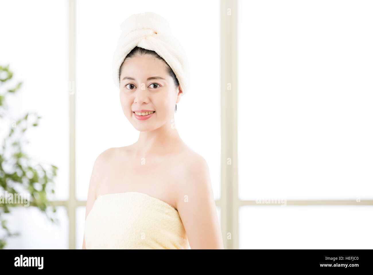 Woman drying body towel hi-res stock photography and images - Alamy