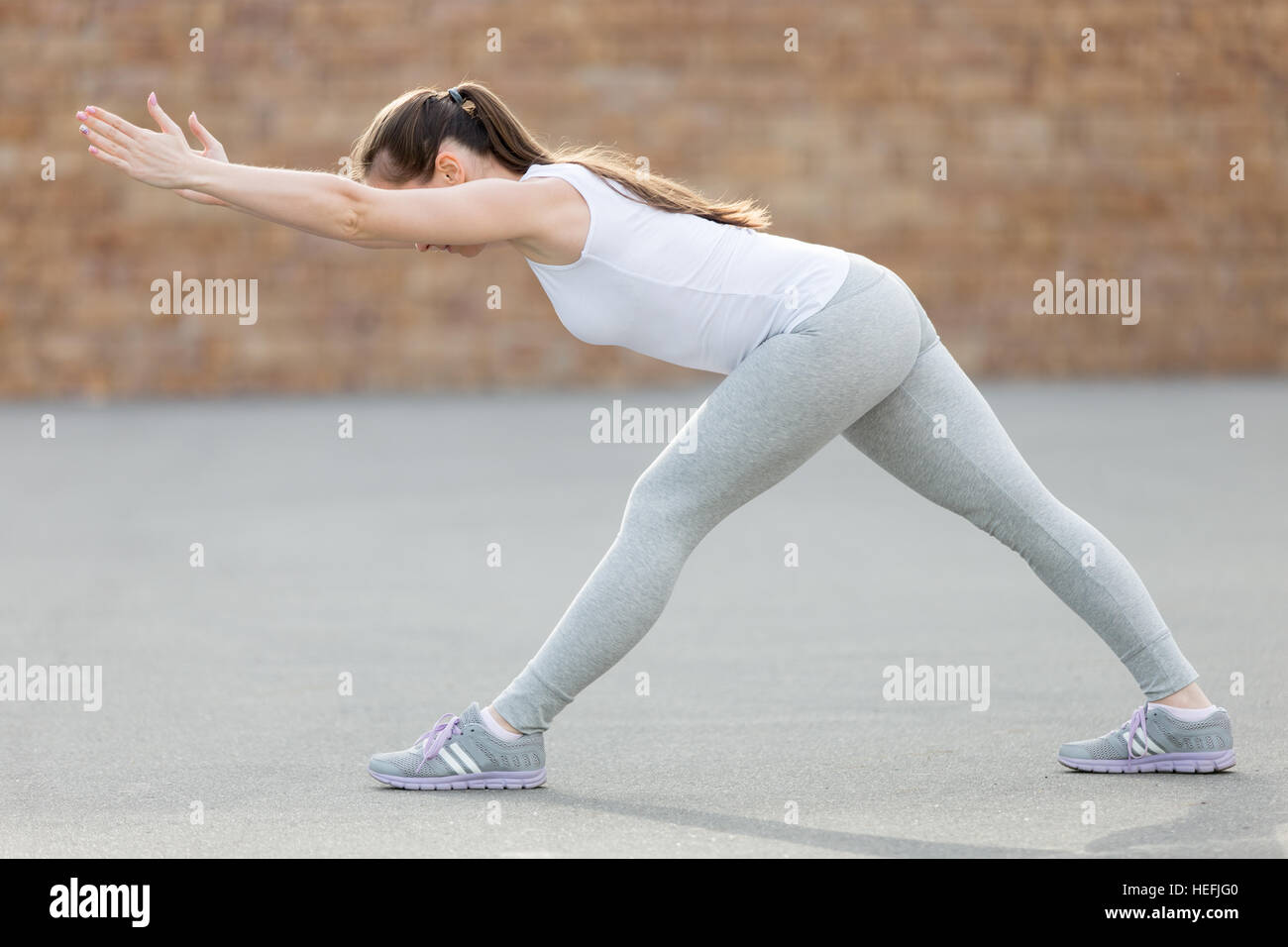 Half Pyramid pose Stock Photo - Alamy