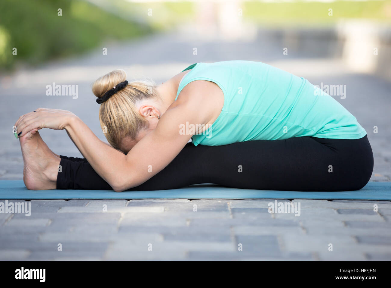 Seated forward bend Stock Photo - Alamy Seated forward bend Stock Photo - Alamy
