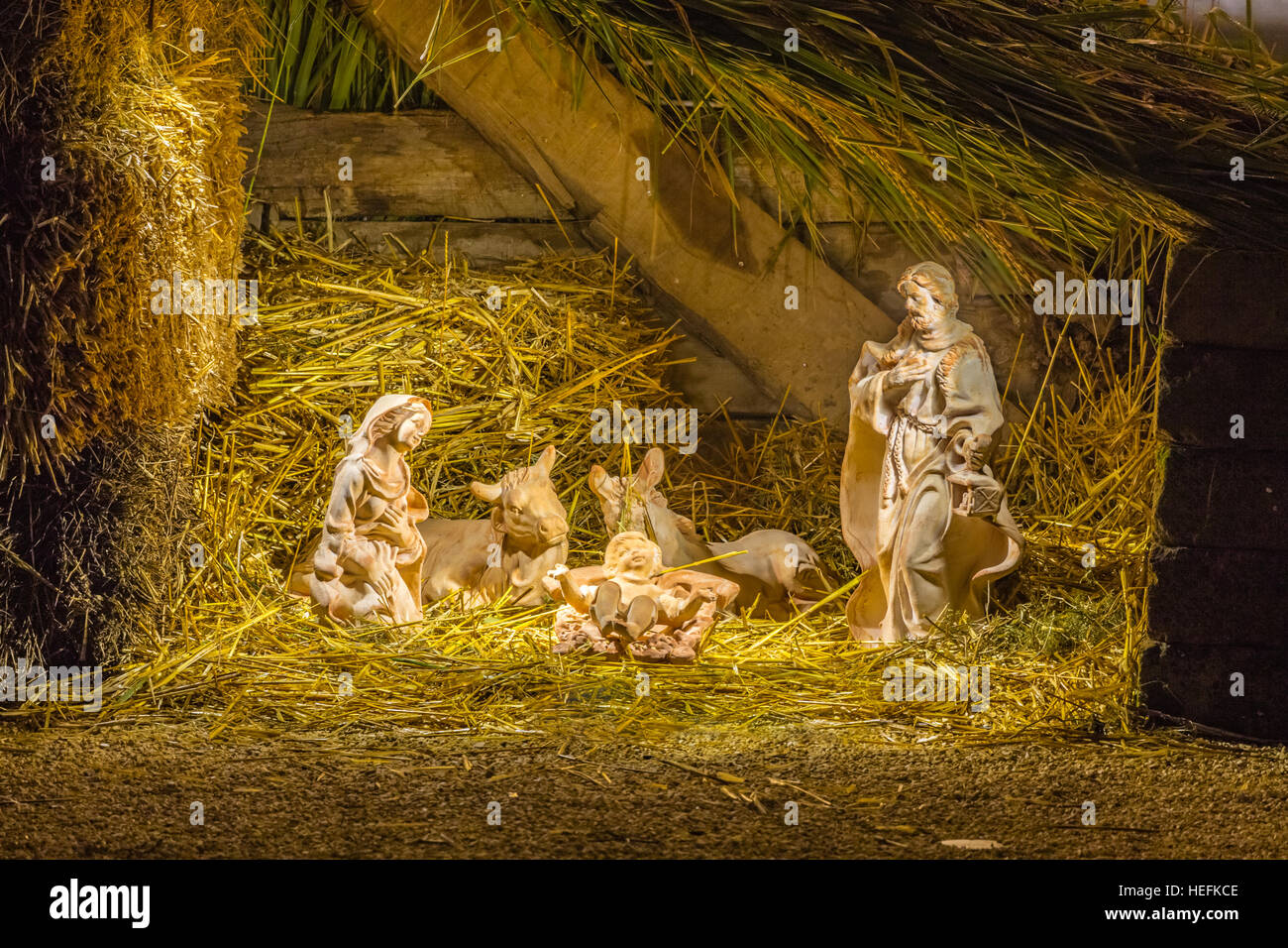 Christmas nativity scene of Holy Baby Jesus in the manger with Blessed ...