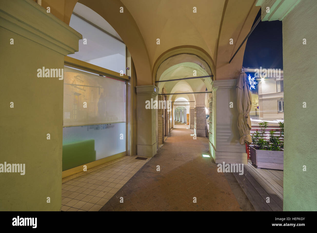 ancient arcade of medieval town shops in Romagna, Italy Stock Photo - Alamy