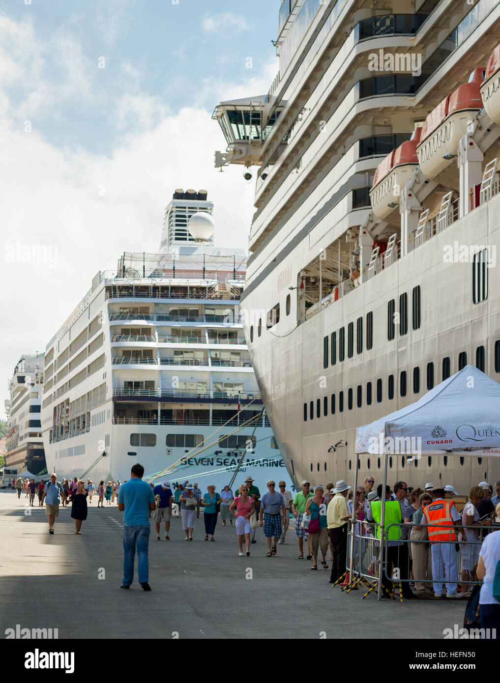 Security checks on passengers reboarding cruise ship. Cunard Queen ...