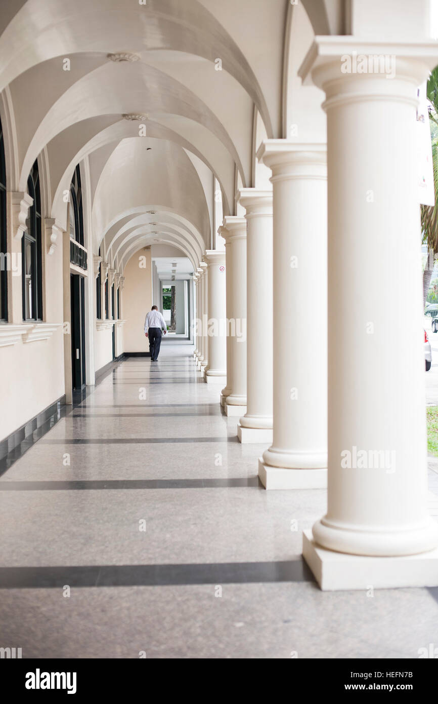 Covered corridor in Singapore build Stock Photo - Alamy