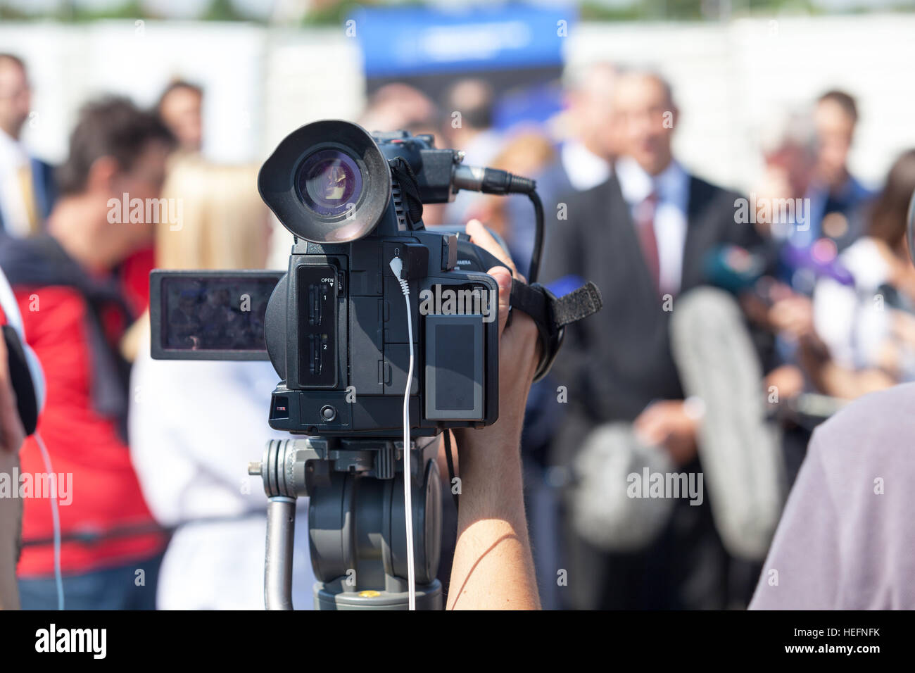 Filming news conference with a television camera Stock Photo - Alamy