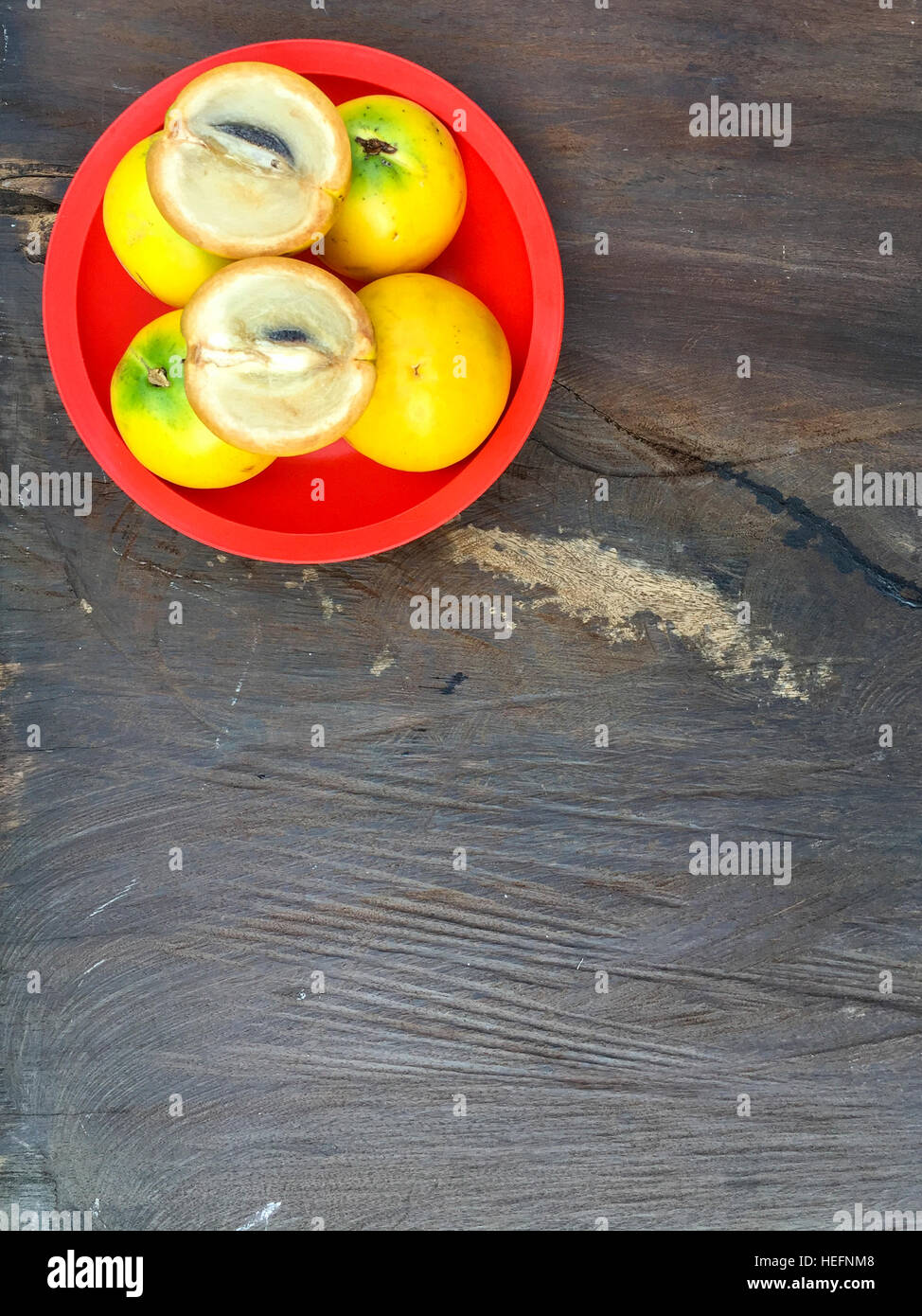 Fresh Abiu fruits on the top of wooden table Stock Photo - Alamy