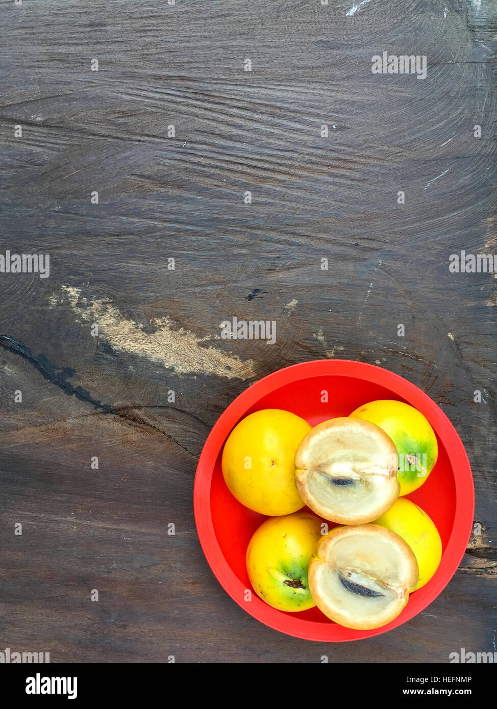 Fresh Abiu fruits on the top of wooden table Stock Photo - Alamy