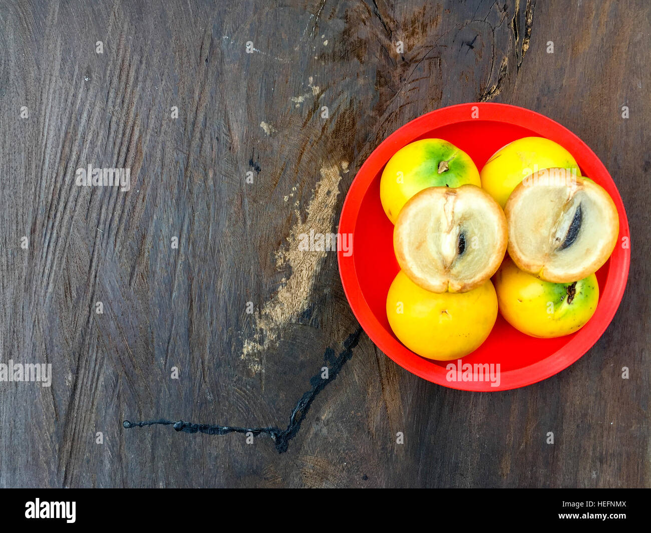 Fresh Abiu fruits on the top of wooden table Stock Photo - Alamy