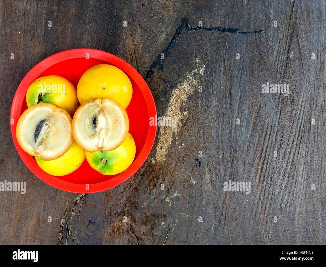 Fresh Abiu fruits on the top of wooden table Stock Photo - Alamy