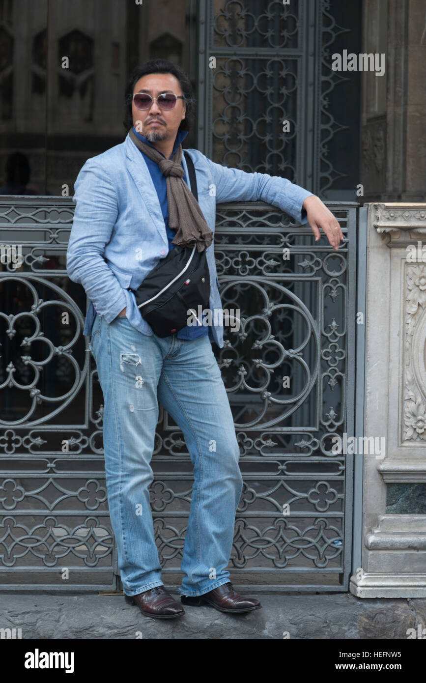 Man standing in front of gate hi-res stock photography and images - Alamy