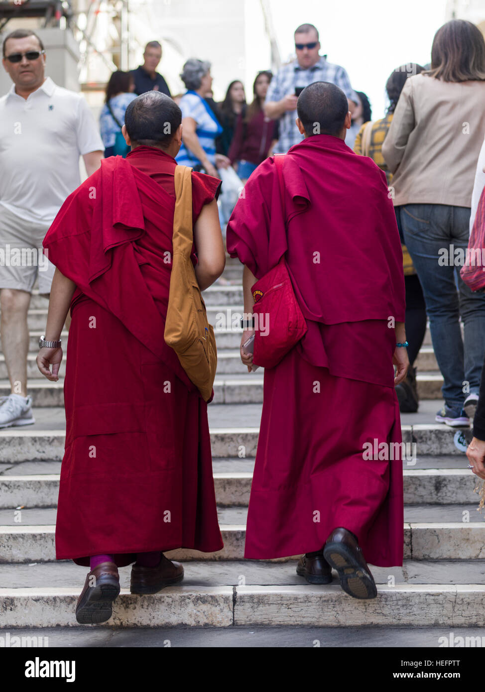 Monk walking up stairs hi-res stock photography and images - Alamy