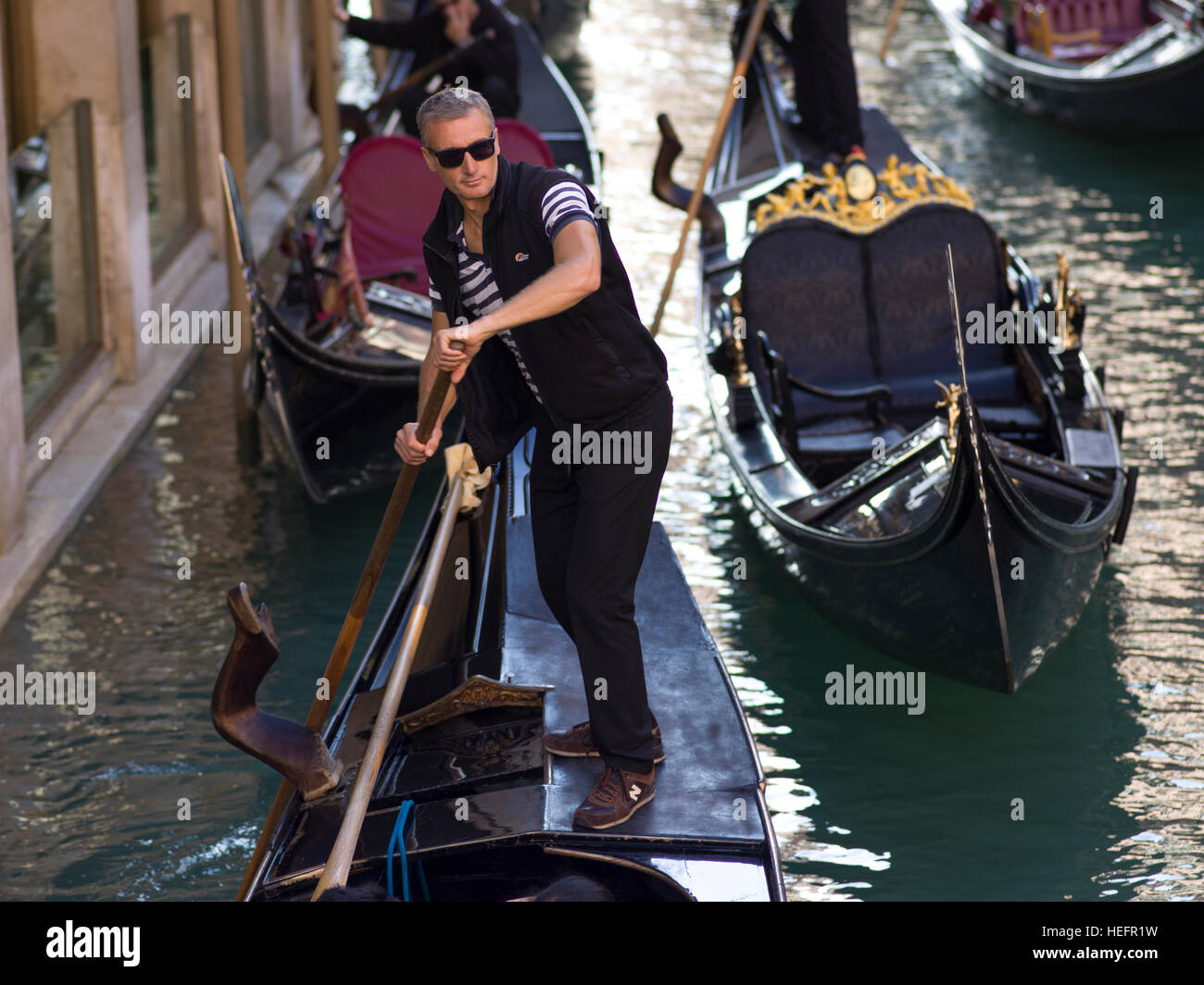 Gondolier steering gondola hi-res stock photography and images - Alamy
