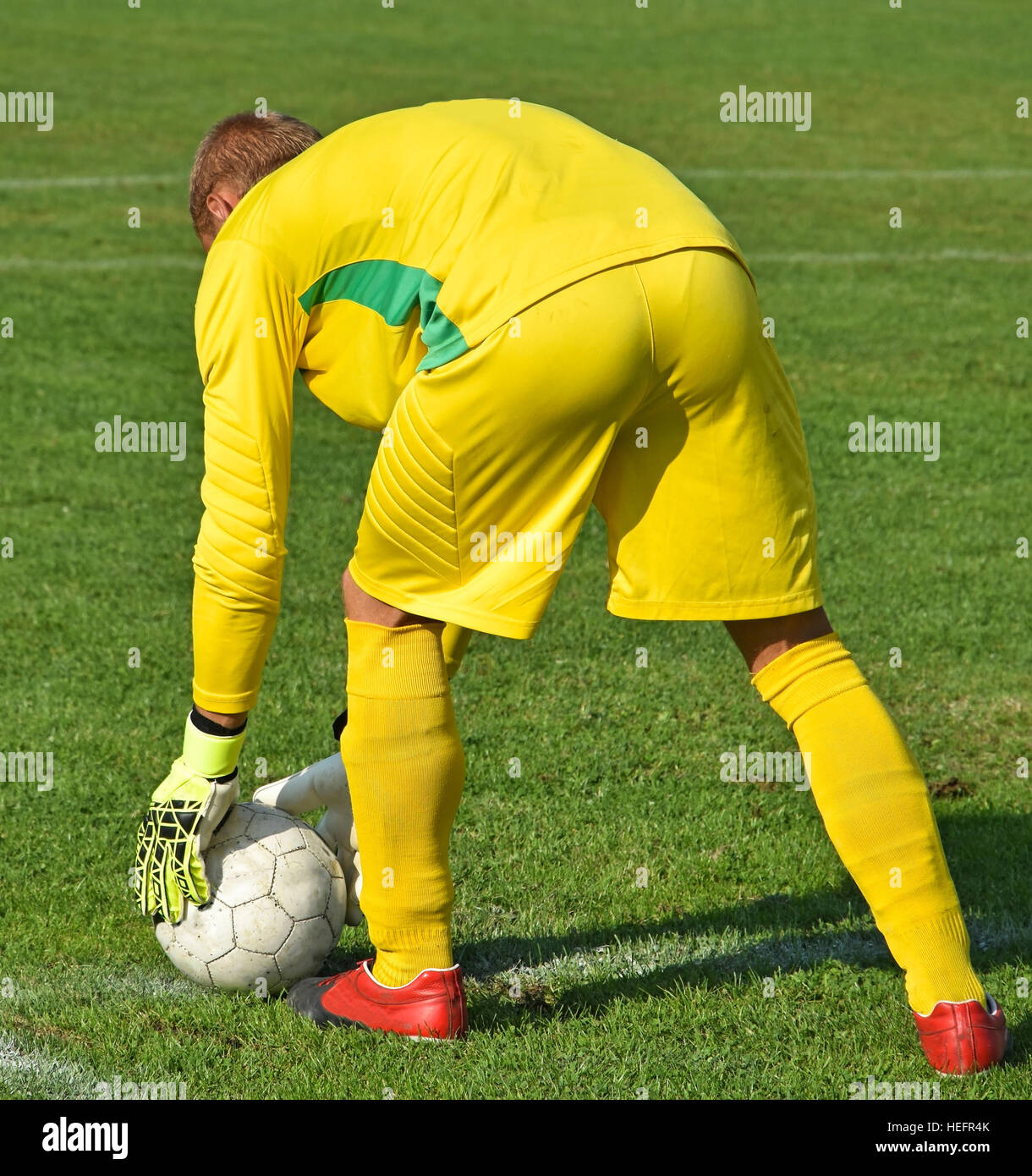 Goalkeeper in action Stock Photo - Alamy