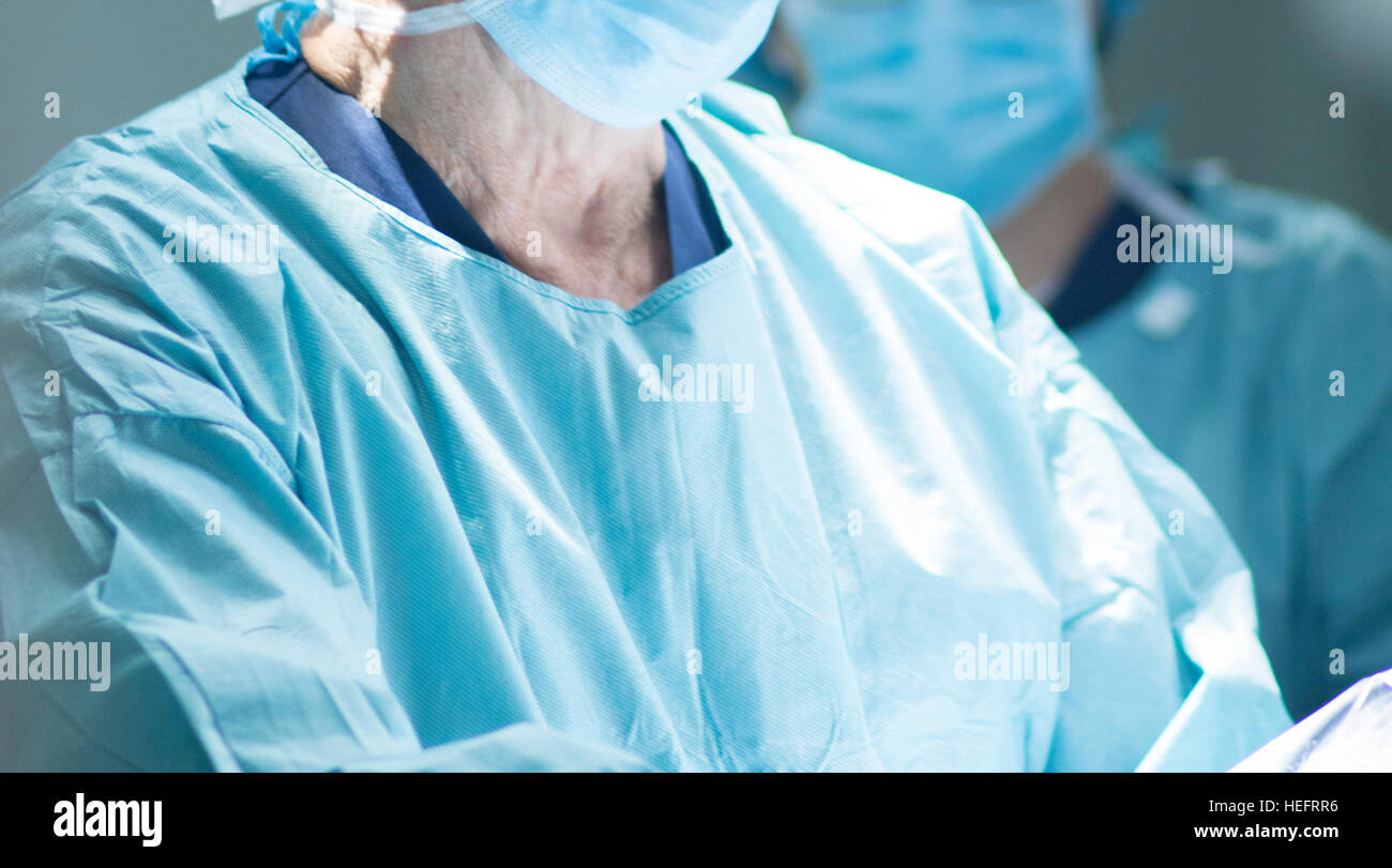 Surgeon in operating theater emergency room surgery in hospital clinic ...