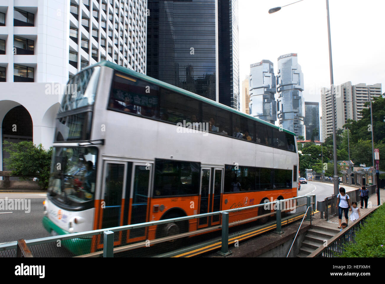 Bus at Financial centre of Hong Kong with his moderm skyscrapers ...