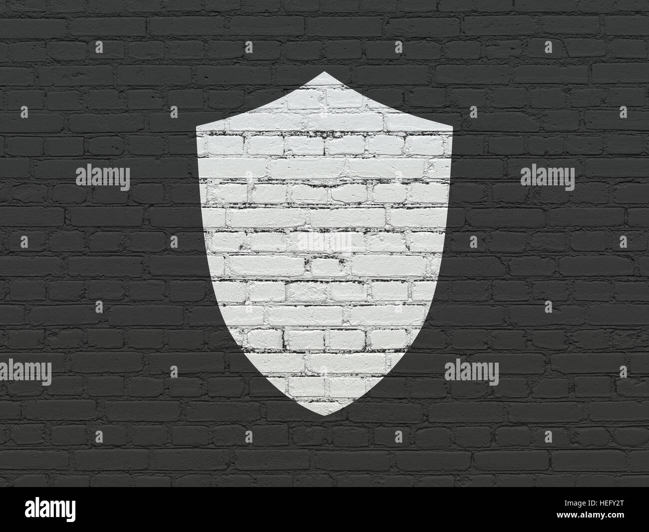 Safety concept: Shield on wall background Stock Photo - Alamy