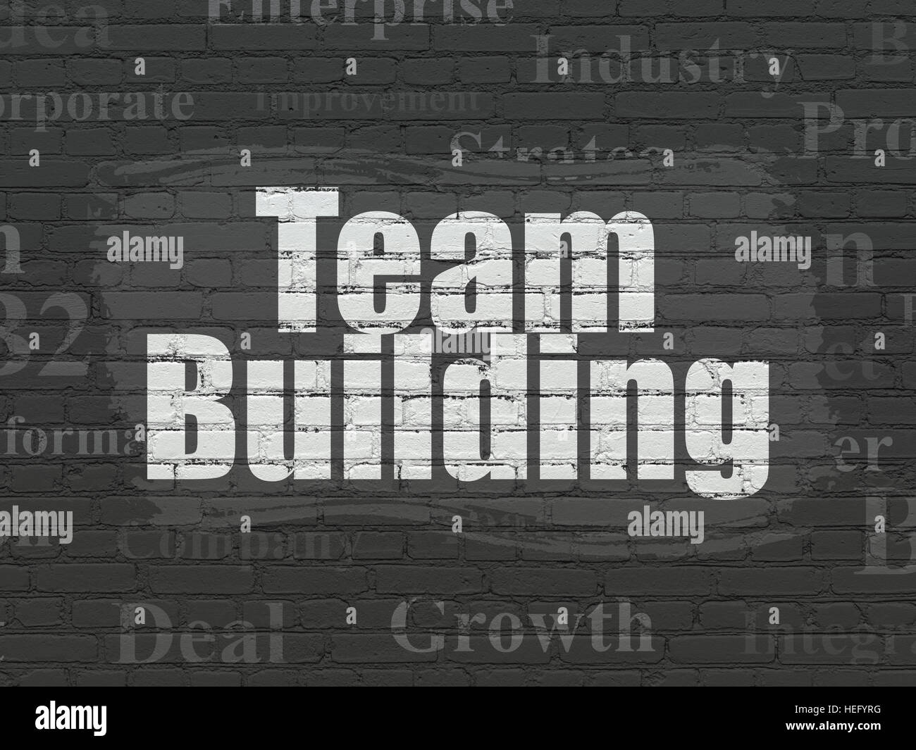 Finance concept: Team Building on wall background Stock Photo - Alamy