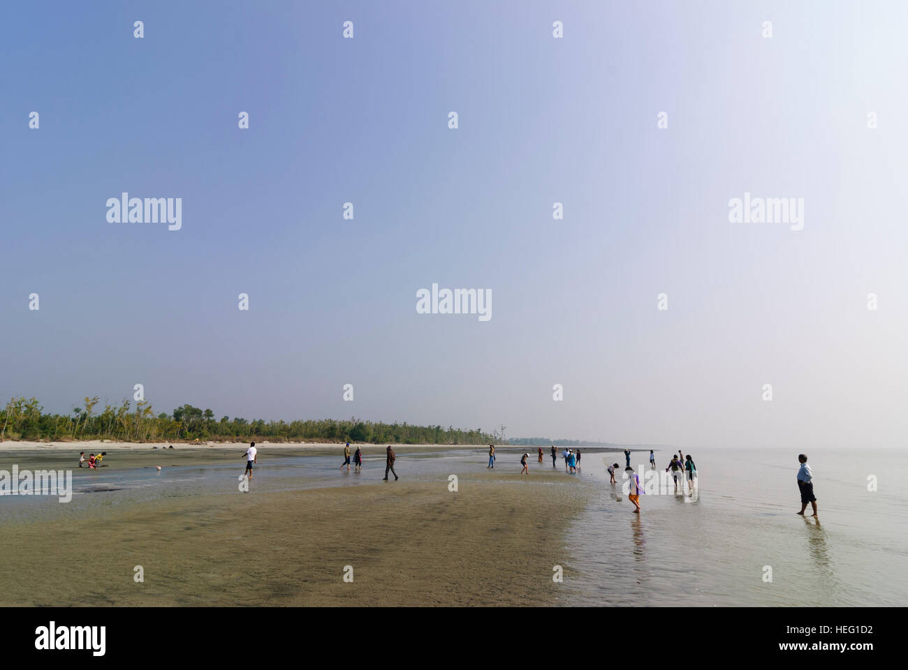 Sundarbans National Park: Cruise tourists on the sand beach at the Gulf ...