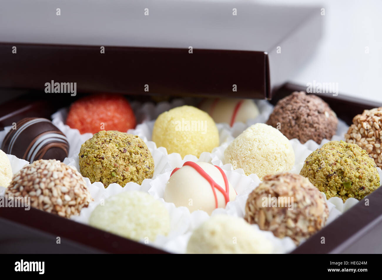 Truffle chocolates in box Stock Photo - Alamy