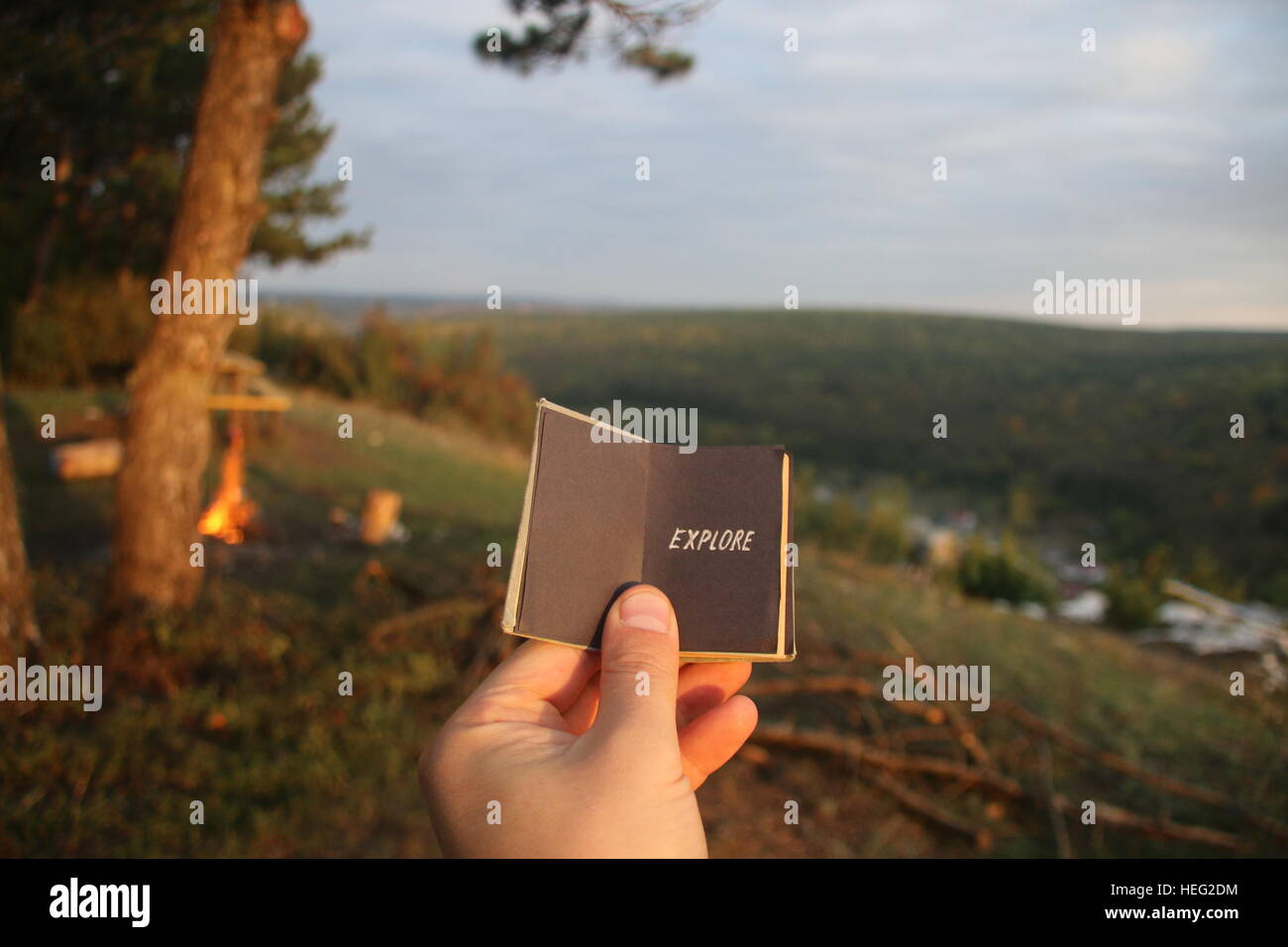 Explore Exploration Journey or Travel idea. Book with text and forest ...