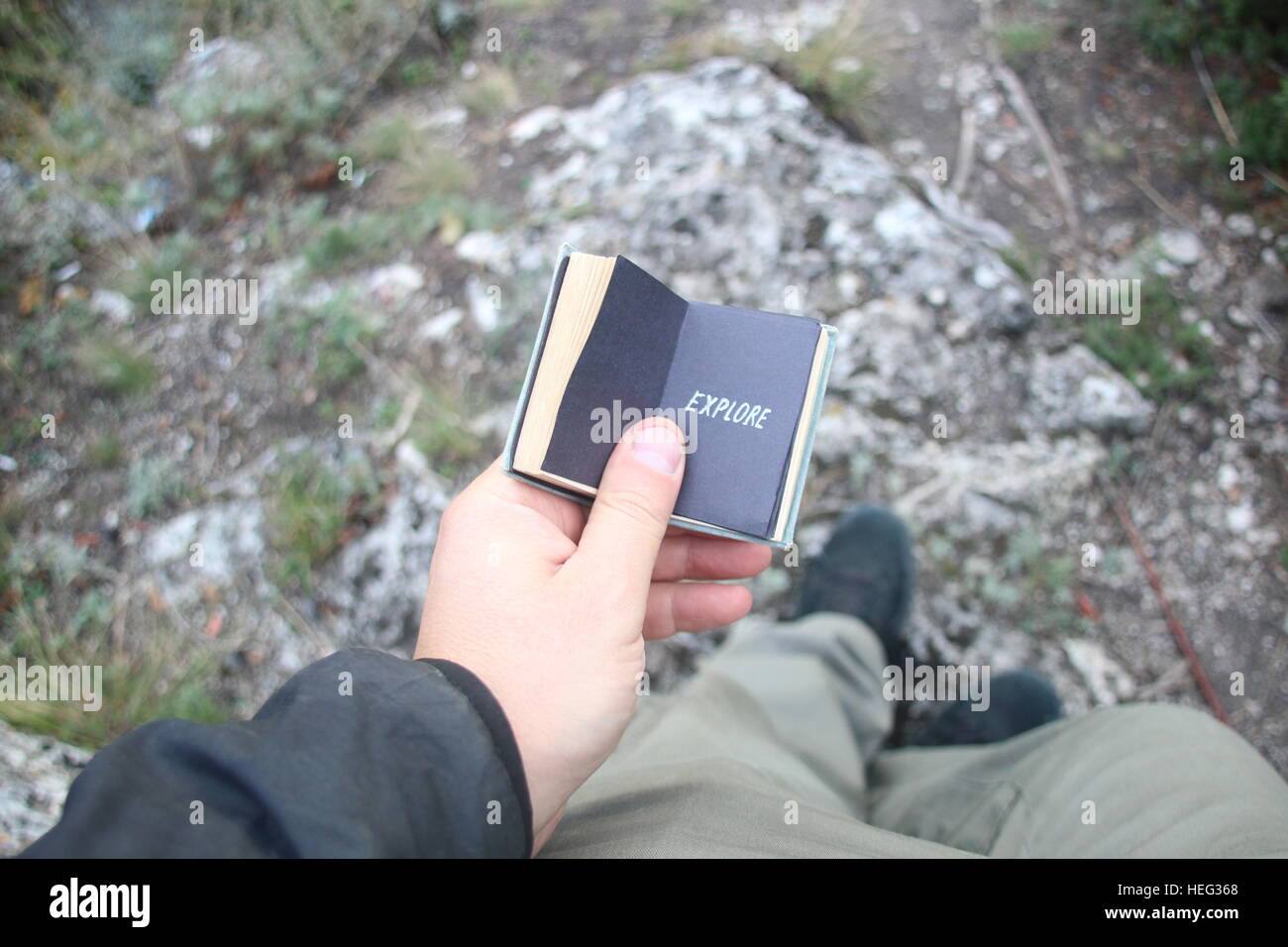 Explore concept, book with text Stock Photo - Alamy