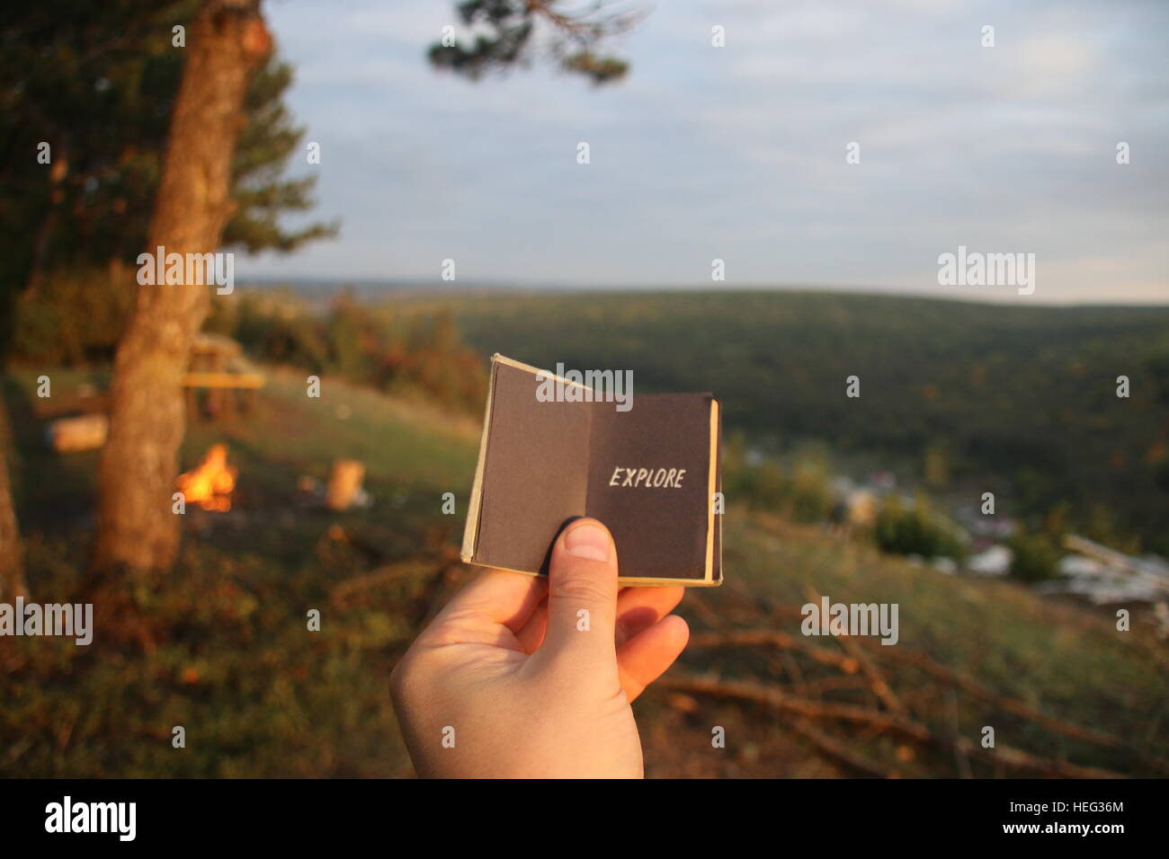 Explore concept, book with text Stock Photo - Alamy