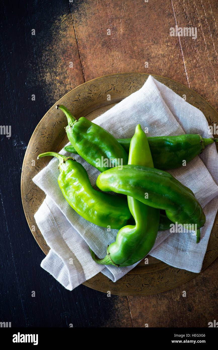 New Mexico green chile, hatch chile on vintage metal plate. Top view ...