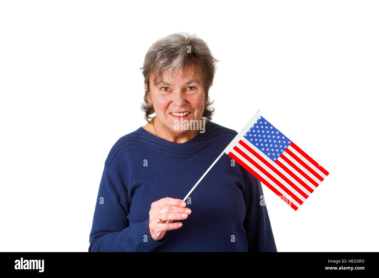 Female senior with american flag - isolated on white background Stock ...