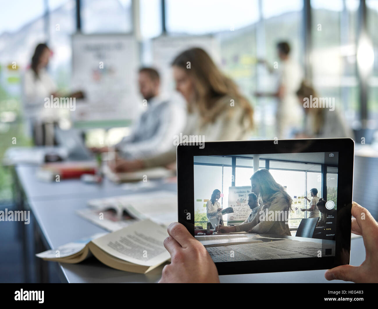 Photo with an iPad, Creative teamwork, presentation, brainstorming ...