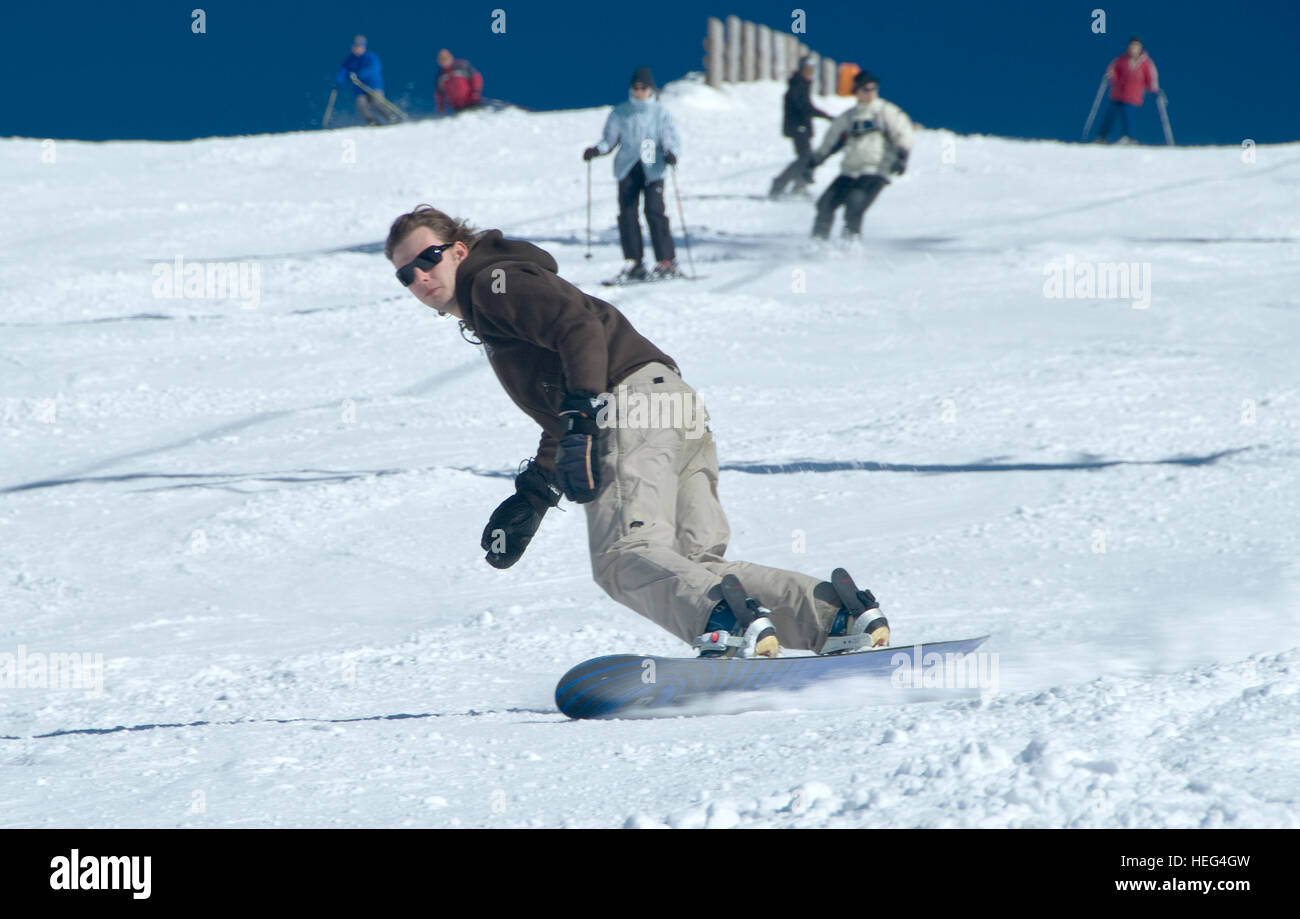 Female skiing down a slope hi-res stock photography and images - Alamy