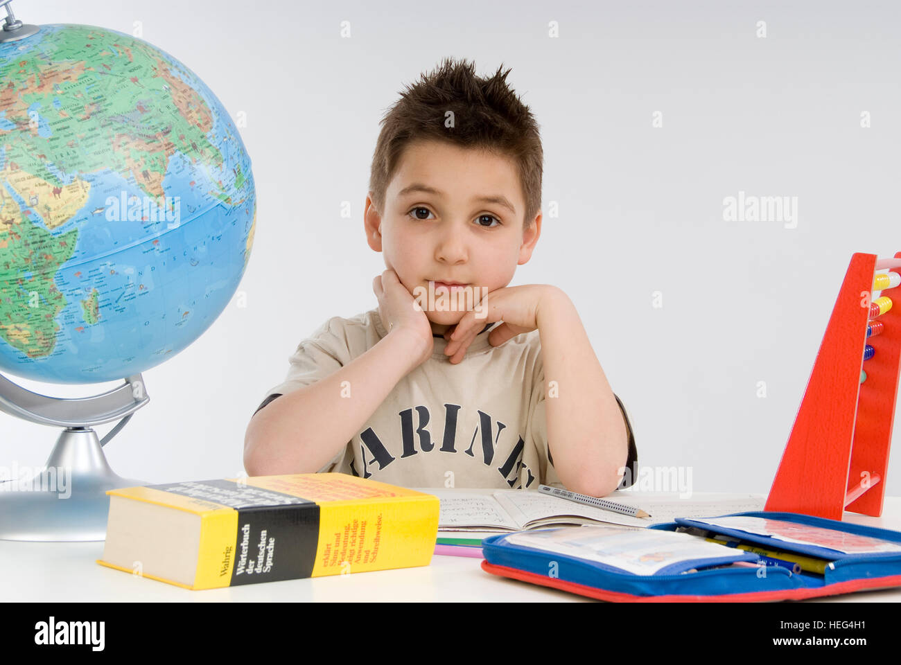 Schoolboy Seven year old Boy Doing His Homework Stock Photo Alamy schoolboy-seven-year-old-boy-doing-his-homework-stock-photo-alamy