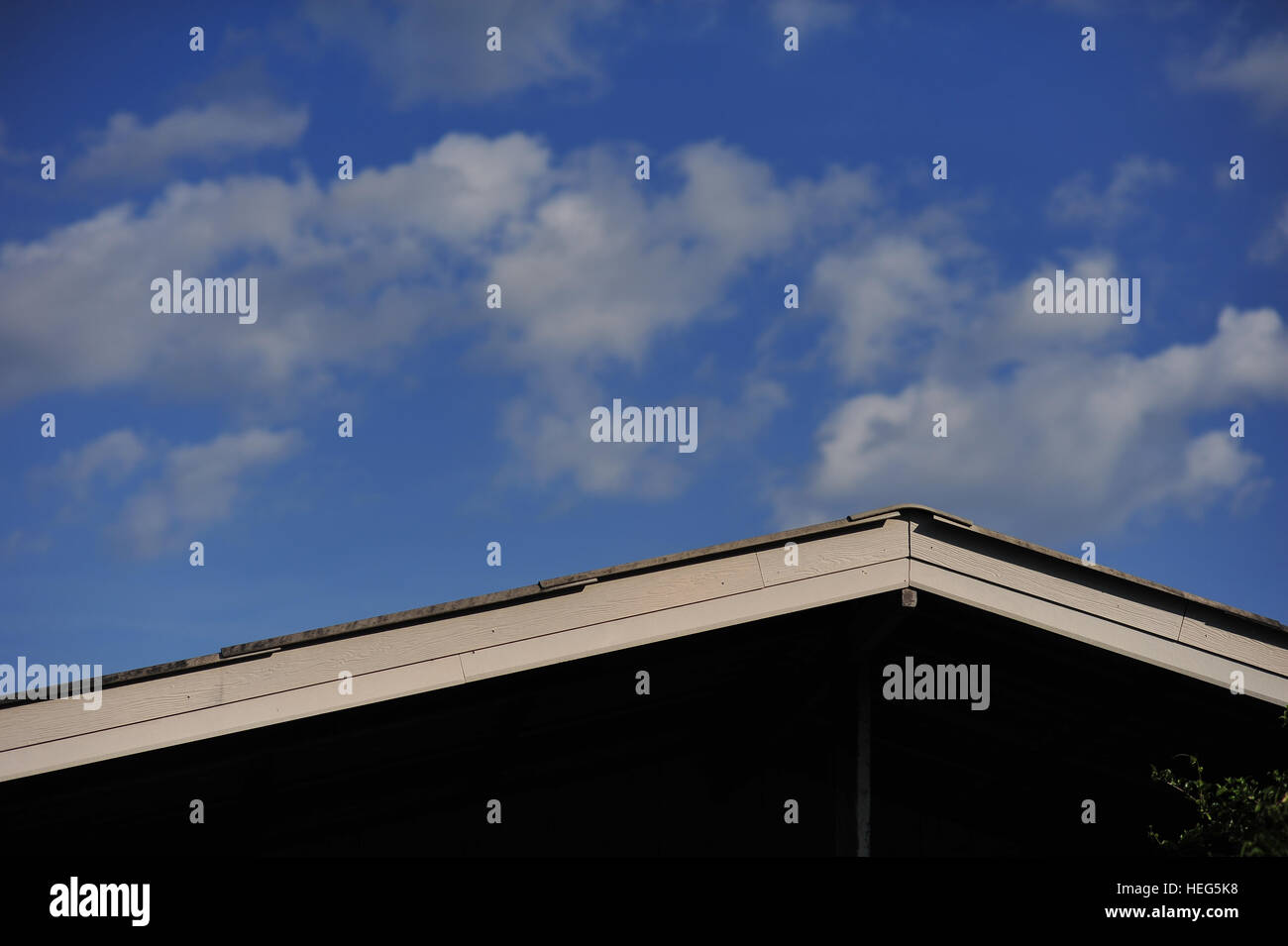 the white roof in front of blue sky and cloud background Stock Photo ...