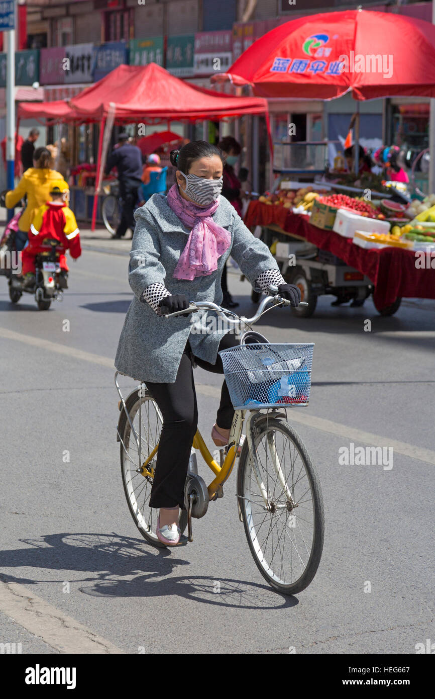 Chinese woman cyclist hi-res stock photography and images - Alamy