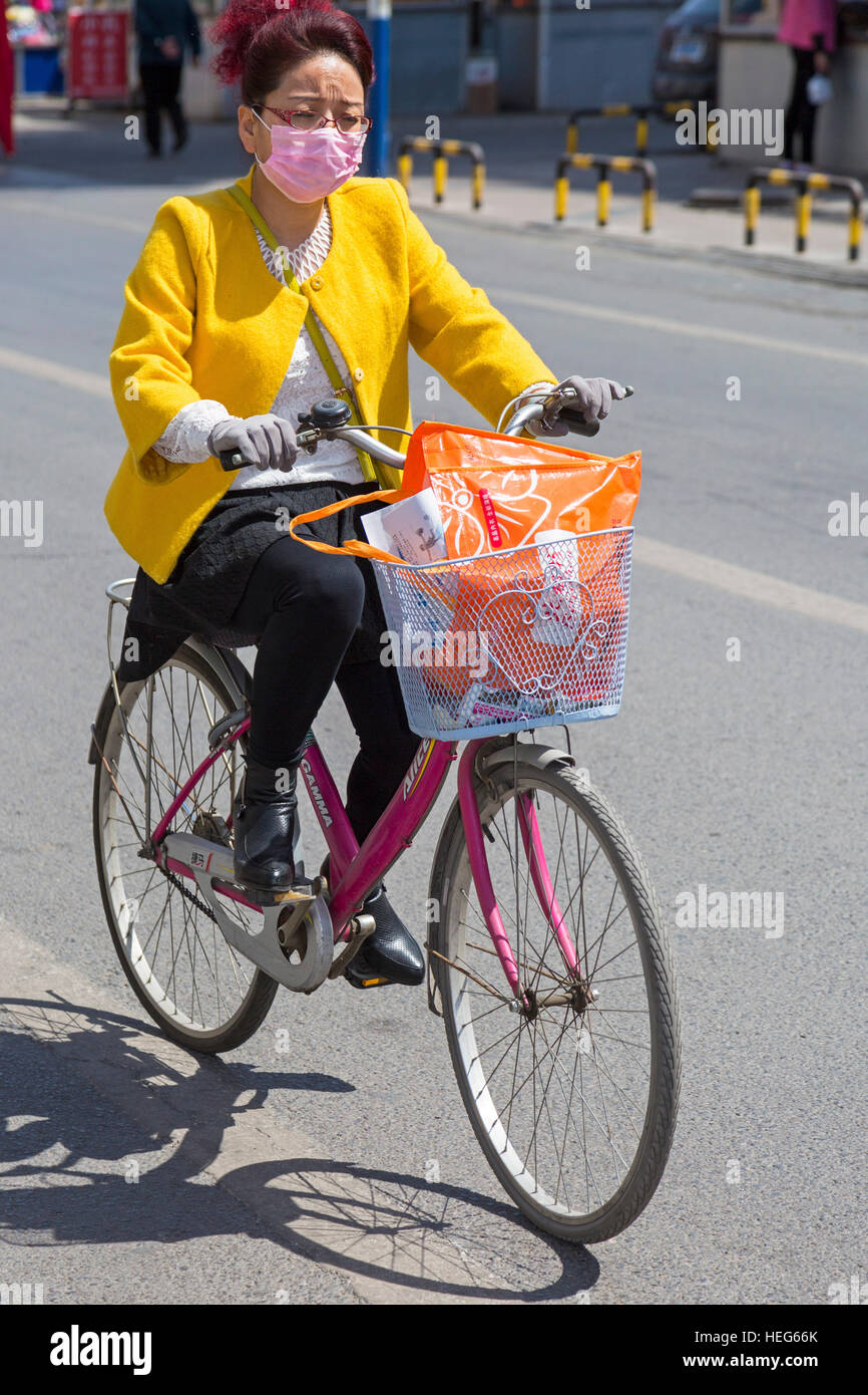 Chinese woman cyclist hi-res stock photography and images - Alamy