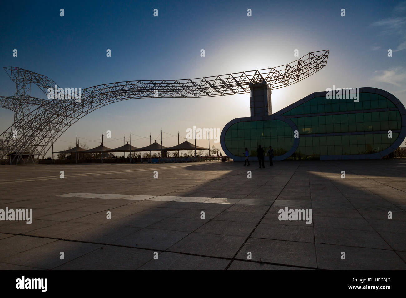 Silhouette of entrance gate to Sand Lake, Shizuishan, Ningxia, China ...